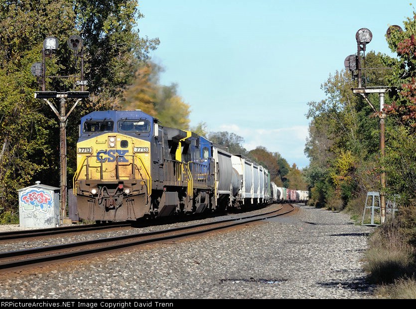 CSX 7713 leads Westbound CSX Q393 at CP 94 on track number one.